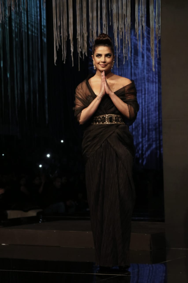 Priyanka Chopra hits the ramp in beautiful black gown, pays tribute to ...
