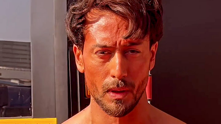 Tiger Shroff flexing his muscular body is too much to handle ...