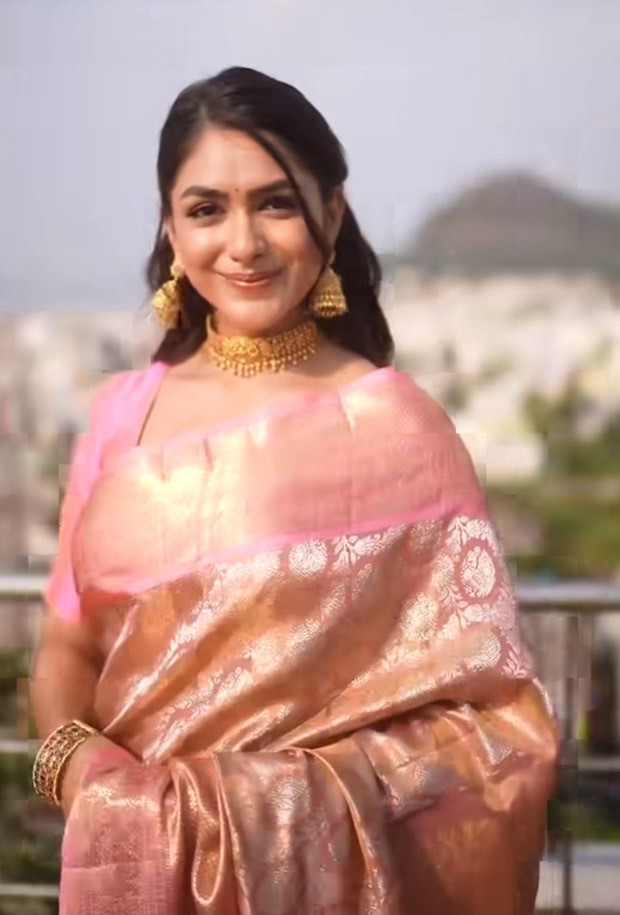 Mrunal Thakur, dressed in a blush pink brocade saree and with gajra in ...