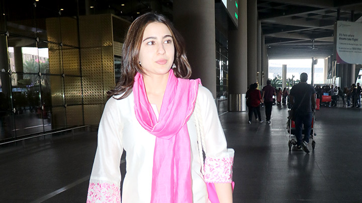 Sara Ali Khan Pairs Up A Pink Dupatta With White Salwar At The Airport Bollywood Hungama