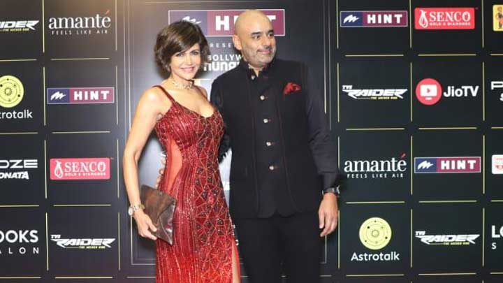 Mandira Bedi looks scintillating in her red shimmery gown as she ...