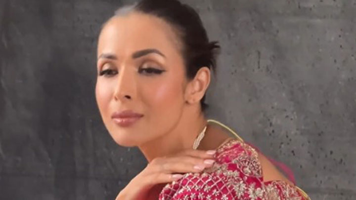 Dripping elegance & grace in this beautiful shade of pink! Malaika Arora - Bollywood Hungama