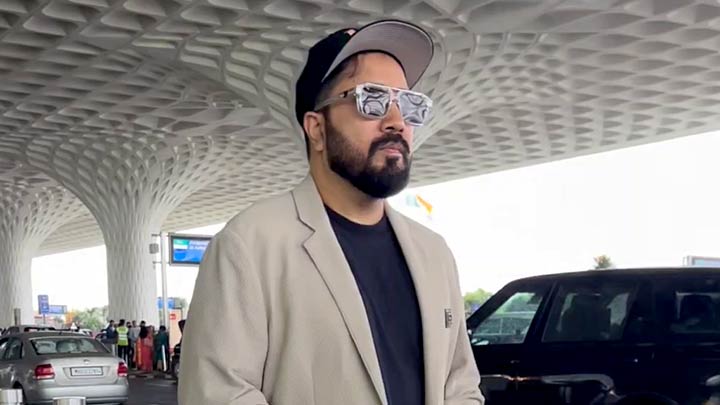 Mika Paji's dashing airport look - Bollywood Hungama